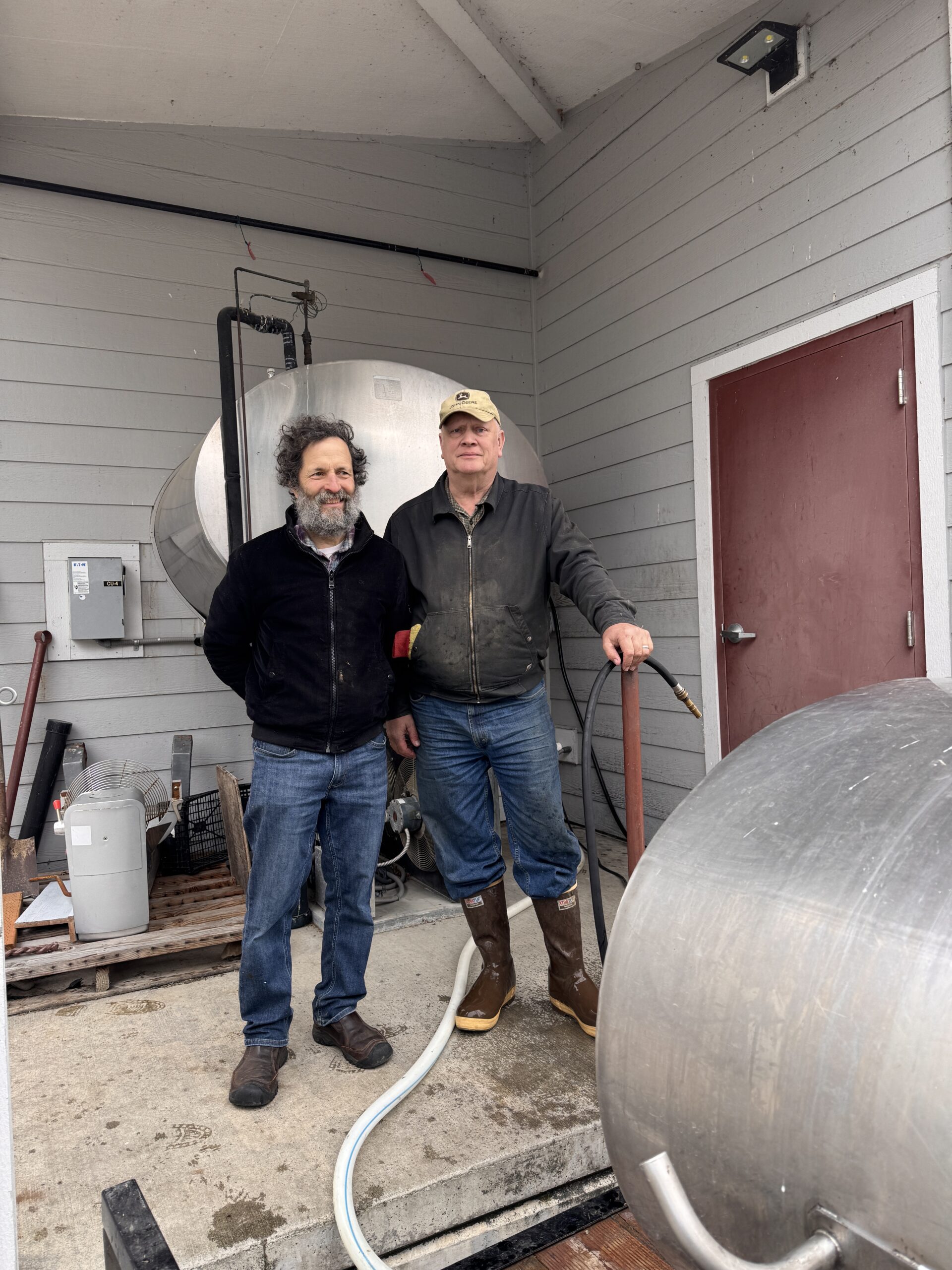 Alan & Roger at raw milk tank – Anacortes Food Coop